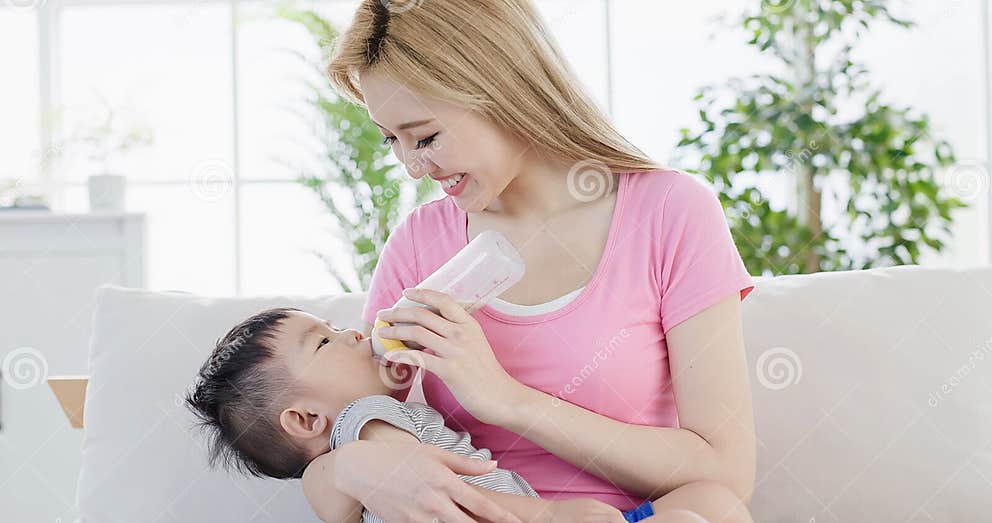 Mom Feeding Milk To Son Stock Image Image Of Food Mommy 117792557