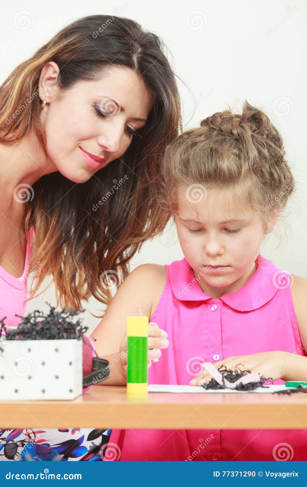 Mom Helping Daughter with Homework Stock Photo - Image of parenting ...