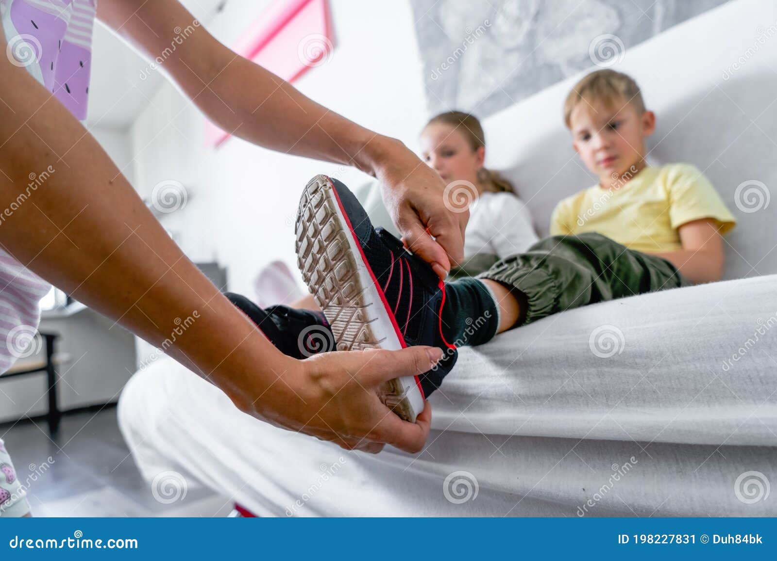 Mom Helps Her Son Take Off His Sneakers Stock Image - Image of teen ... Mom Helps Her Son Take Off His Sneakers Stock Image - Image of teen ...