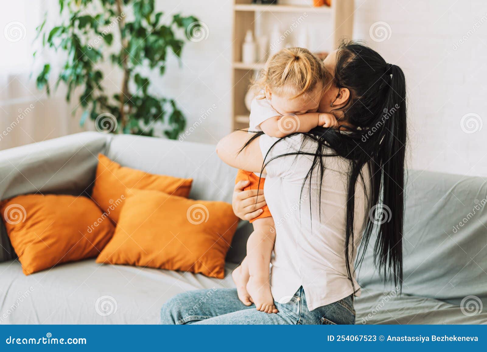 Mom Hugs and Soothes a Crying Child Stock Image - Image of adorable ...