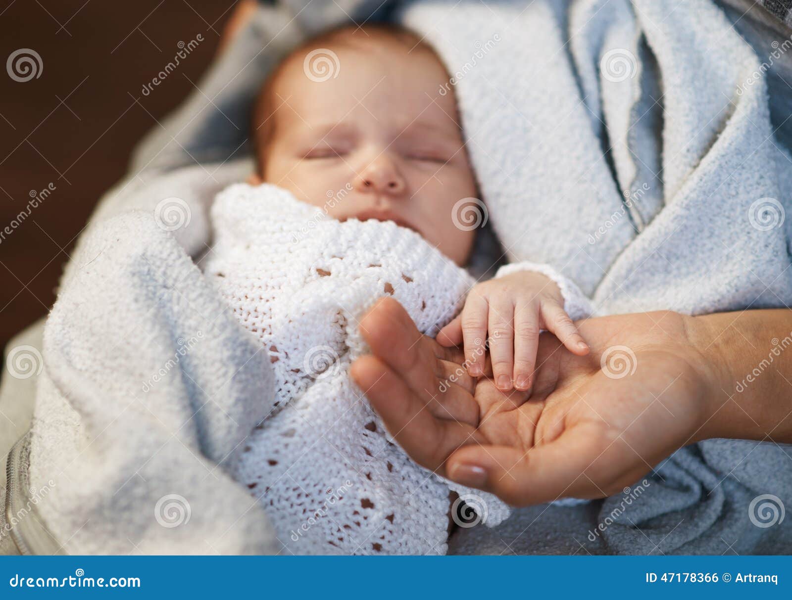 Mom Keeps Miniature Hand Newborn Baby in Hands Stock Photo - Image of ...