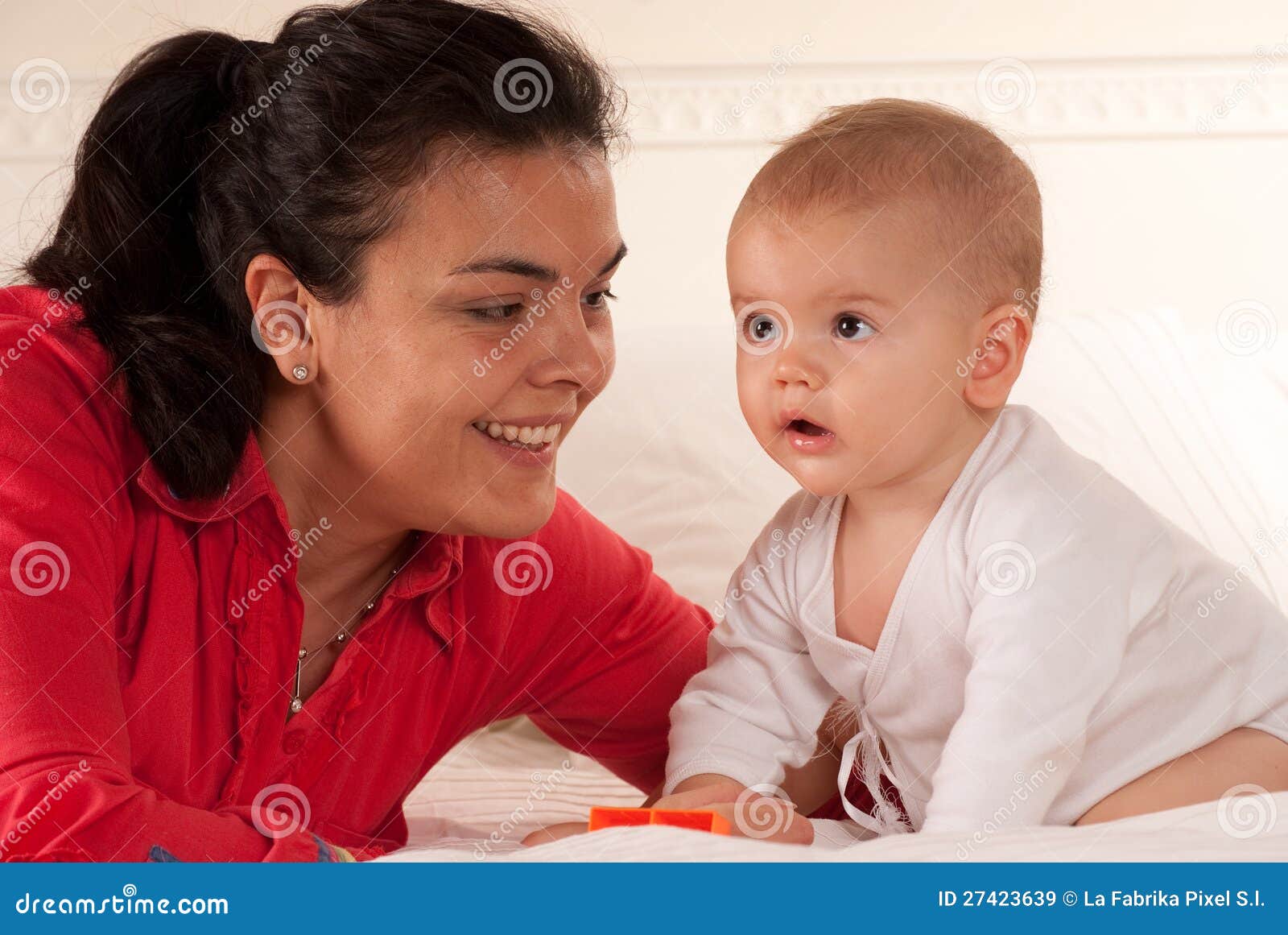 Mom looking at her baby stock image. Image of toddler - 27423639