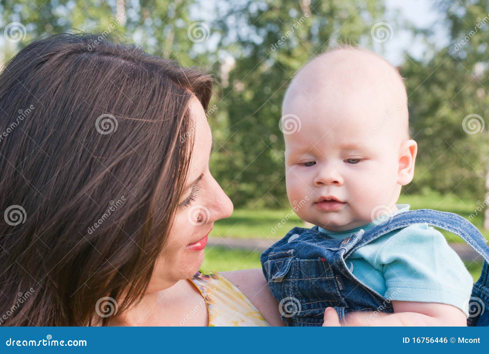 Mom looks at her kid stock photo. Image of smiling, toddler - 16756446