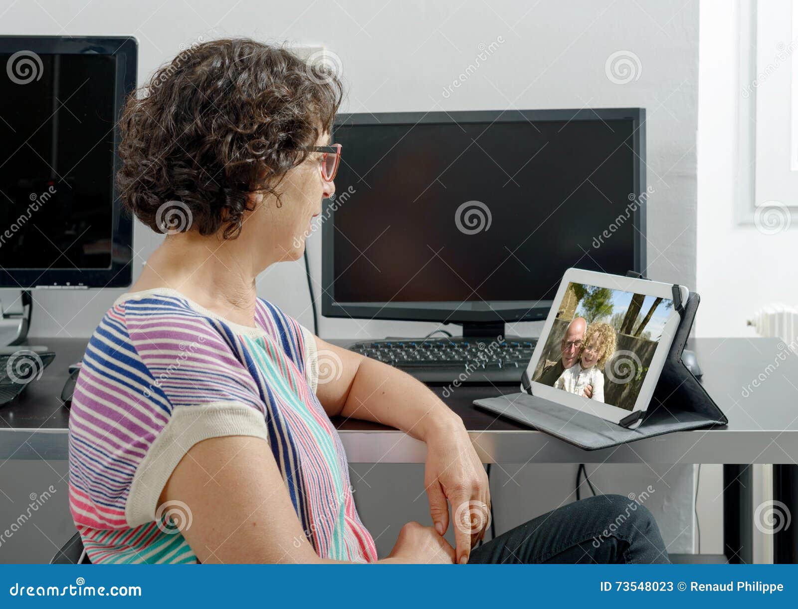 Mom Making a Distant Call on Internet Stock Image - Image of networking ...