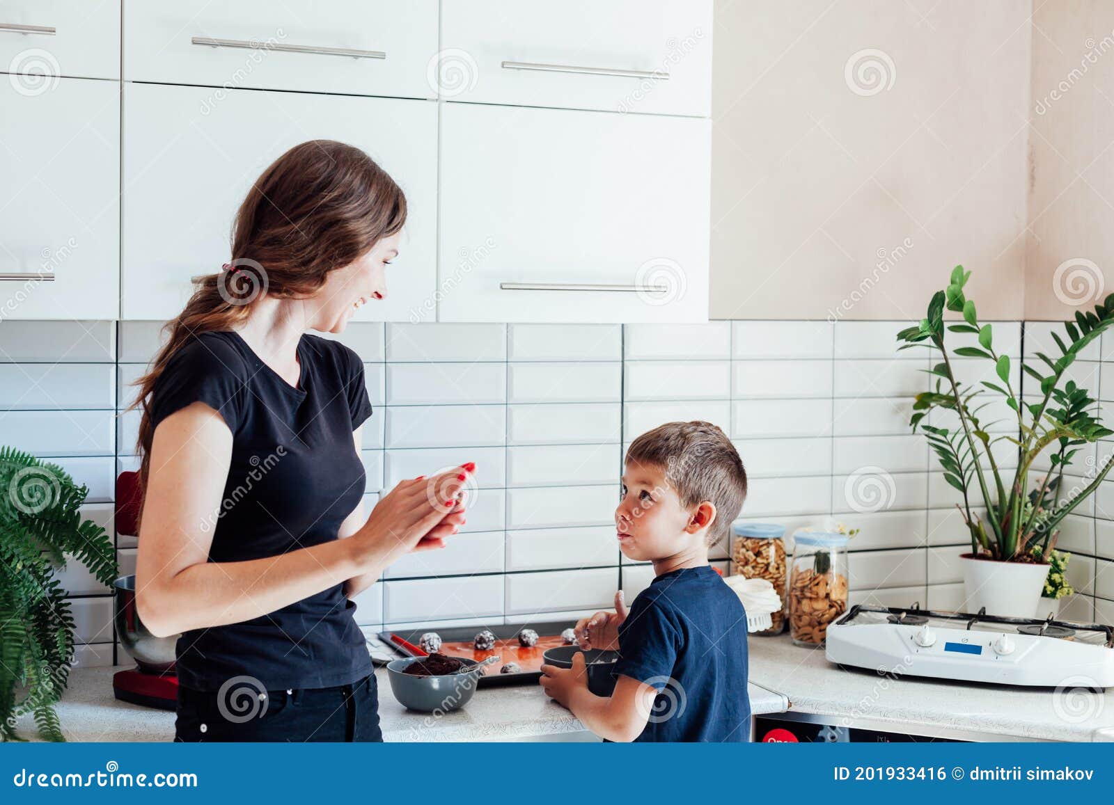 Mom Pastry Chef and Son Cook Sweet Cakes in the Kitchen Stock Photo ...