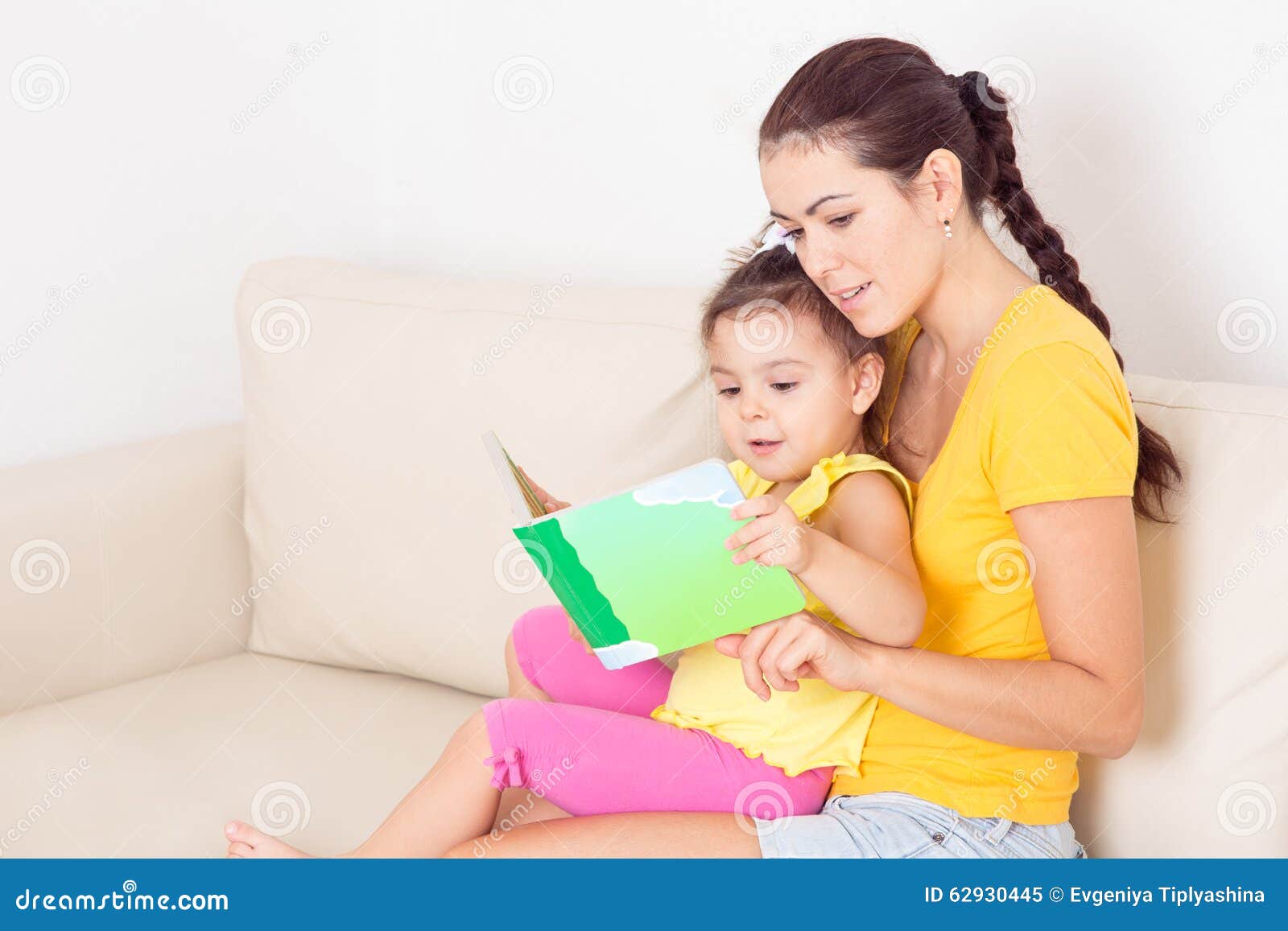 Mom reading a book stock image. Image of cheerful, love - 62930445