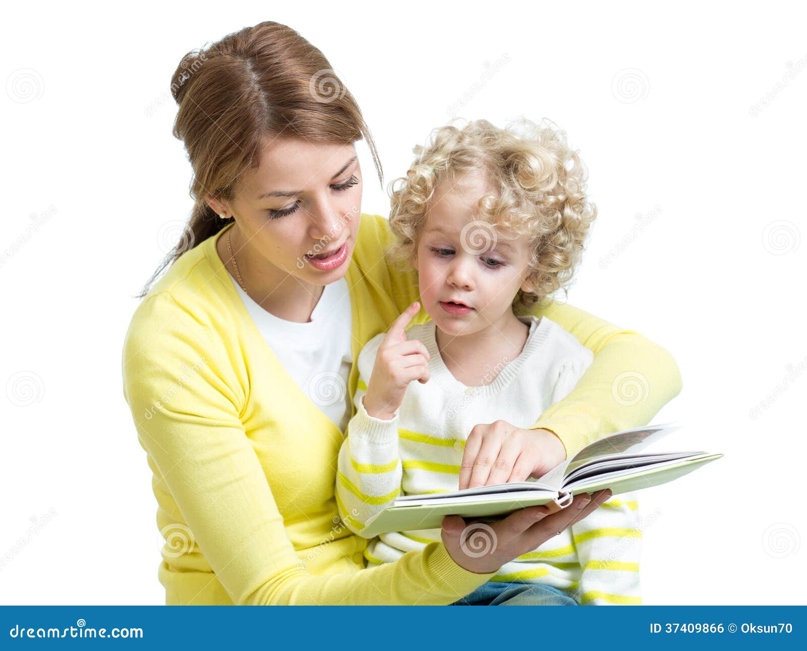 Mom reading a book to kid stock photo. Image of finger - 37409866