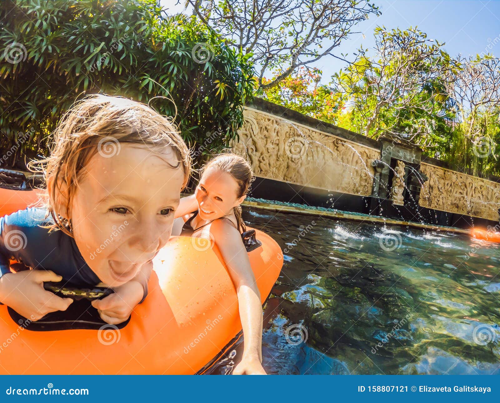 Mom and Son Have Fun at the Water Park Stock Image - Image of nature ...