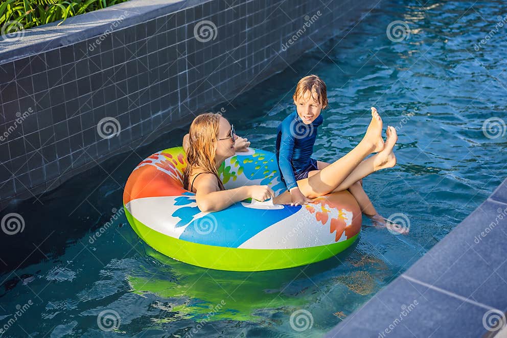 Mom And Son Have Fun At The Water Park Stock Image Image Of Pool