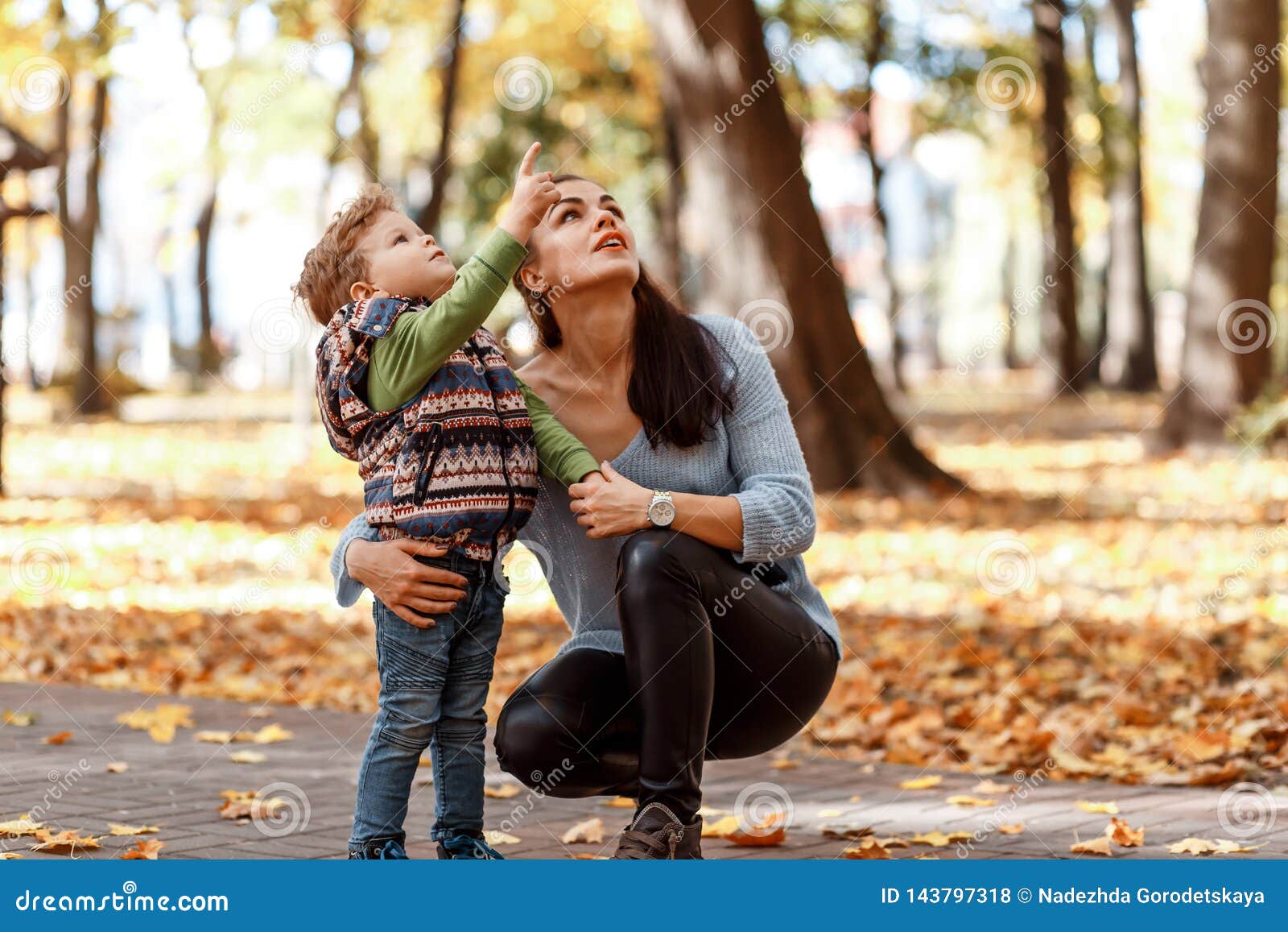 Mom and Son Having Fun in the Park in Autumn Stock Photo - Image of ...