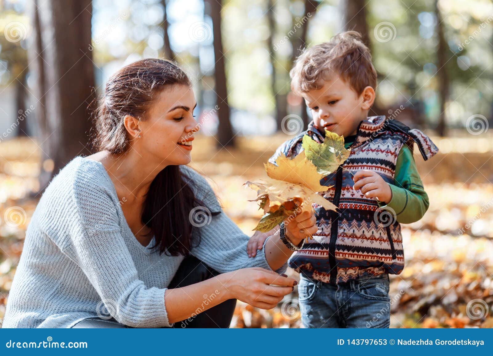 Mom and Son Having Fun in the Park in Autumn Stock Image - Image of ...