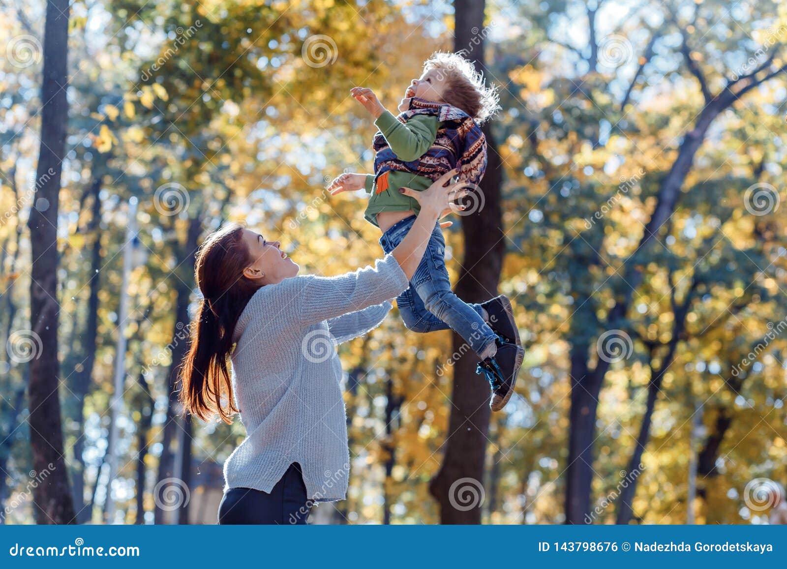 Mom and Son Having Fun in the Park in Autumn Stock Photo - Image of ...