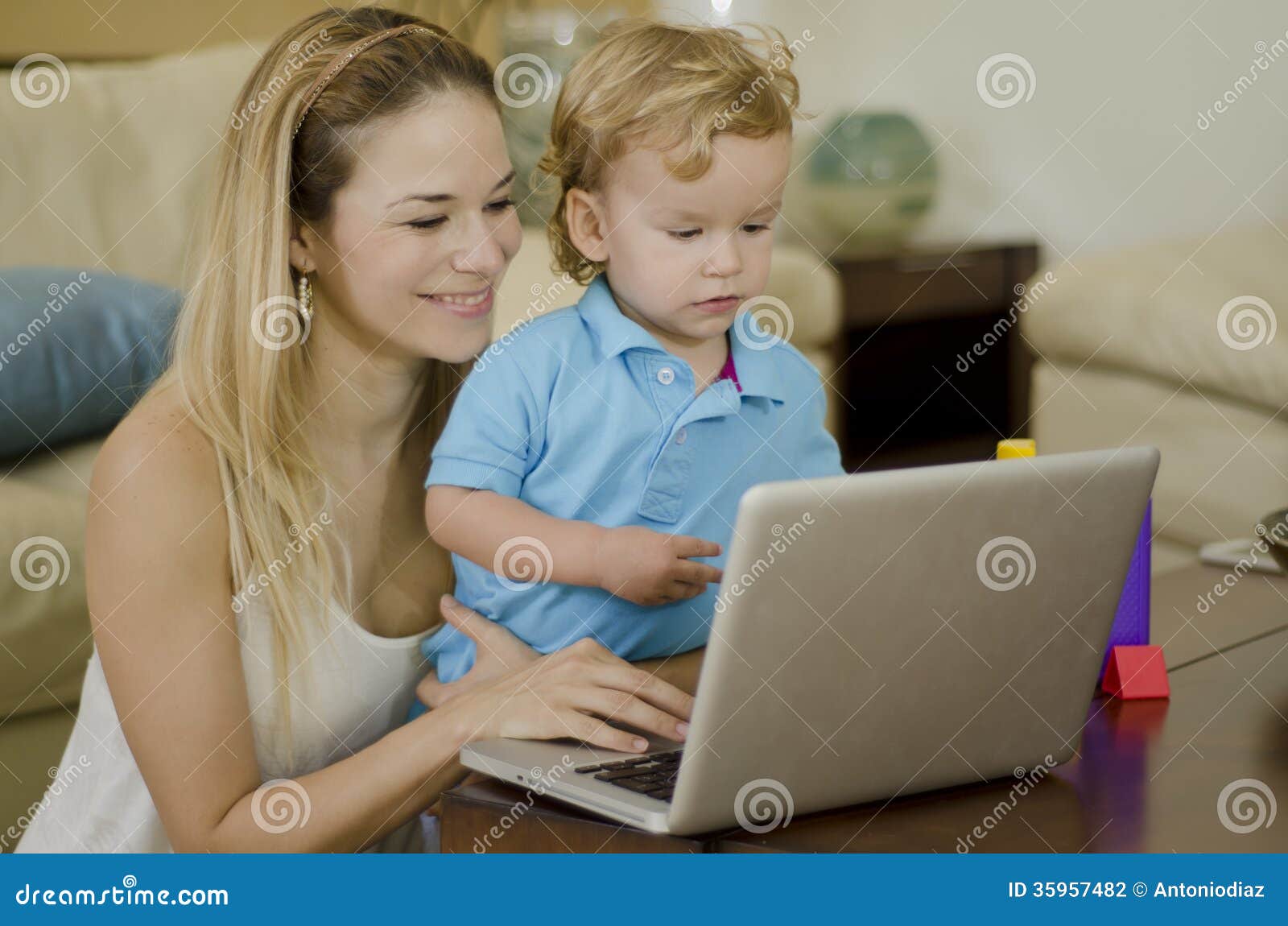 Mom and son having fun stock photo. Image of living, pretty - 35957482