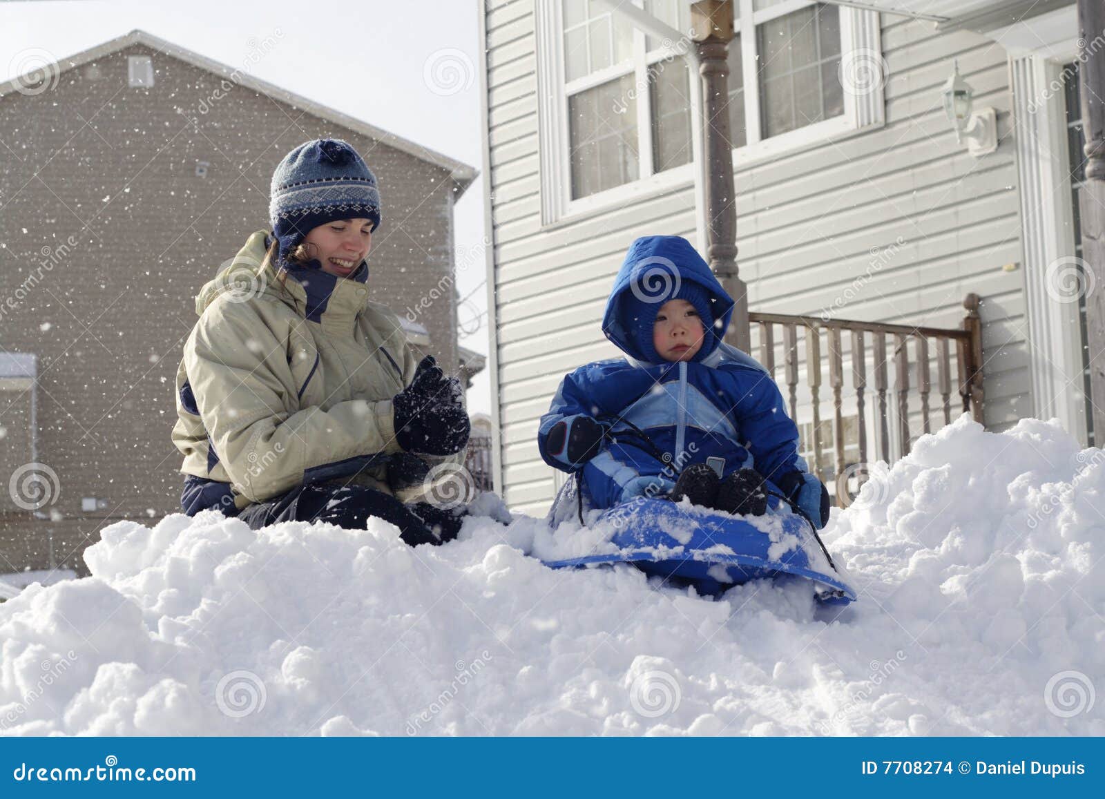 Mom And Son Playing In Snow Picture. Image: 7708274