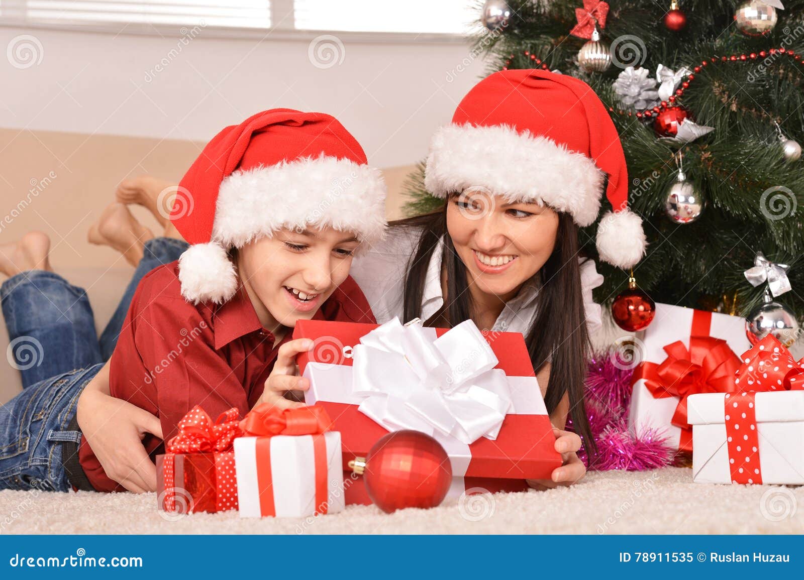 Mom and son in santa hats stock image. Image of caucasian - 78911535