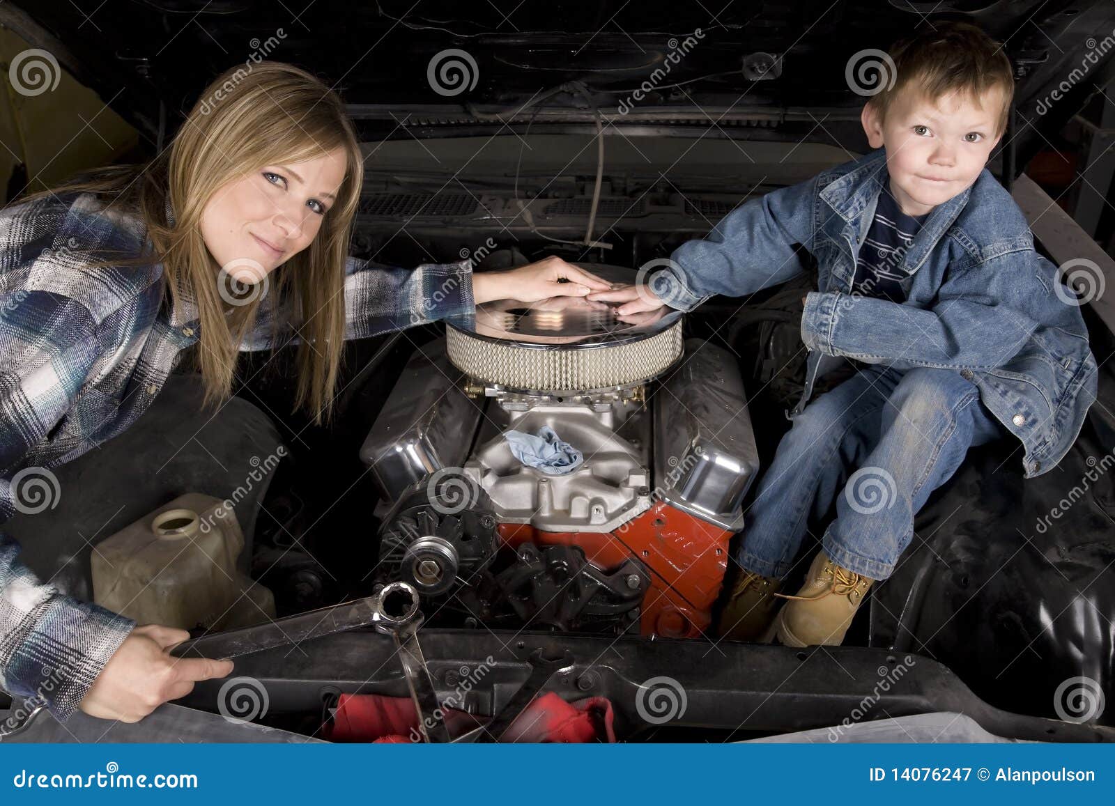 Mom and son working on car stock image. Image of breakdown - 14076247