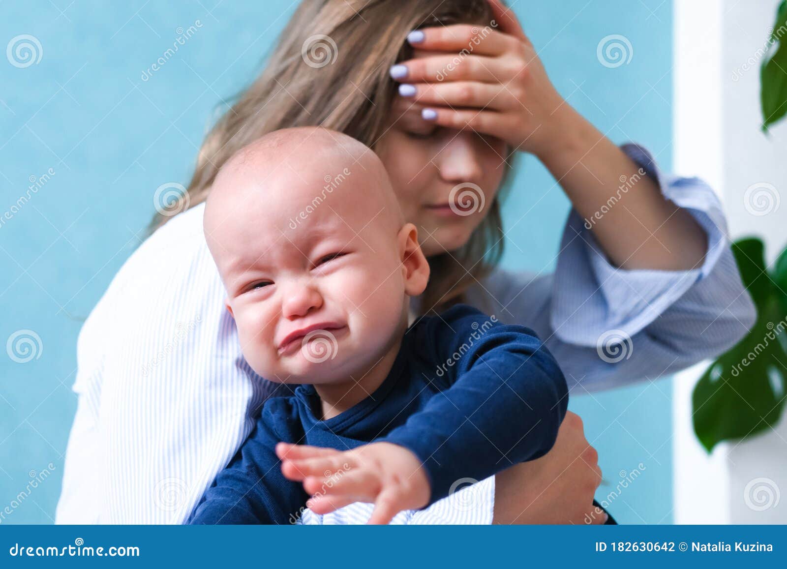 Mom Tired Trying To Calm Her Crying Baby. Newborn Tantrum Child on ... Mom Tired Trying To Calm Her Crying Baby. Newborn Tantrum Child on ...
