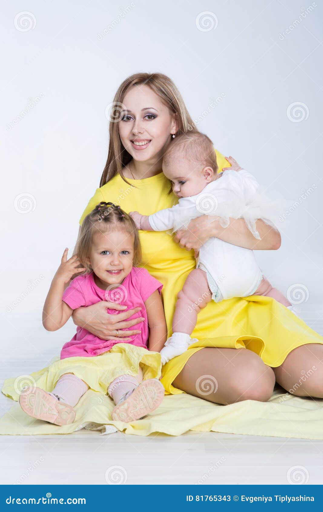 Mom and two kids stock image. Image of isolated, lifestyle - 81765343
