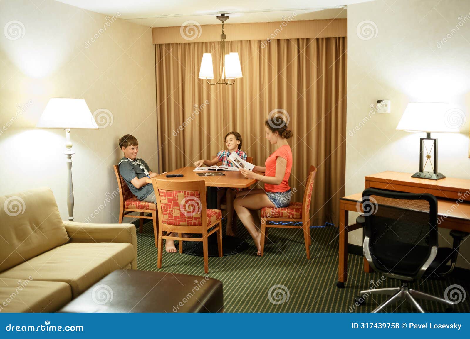 Mom with Two Kids Read Magazines at the Stock Photo - Image of female ...