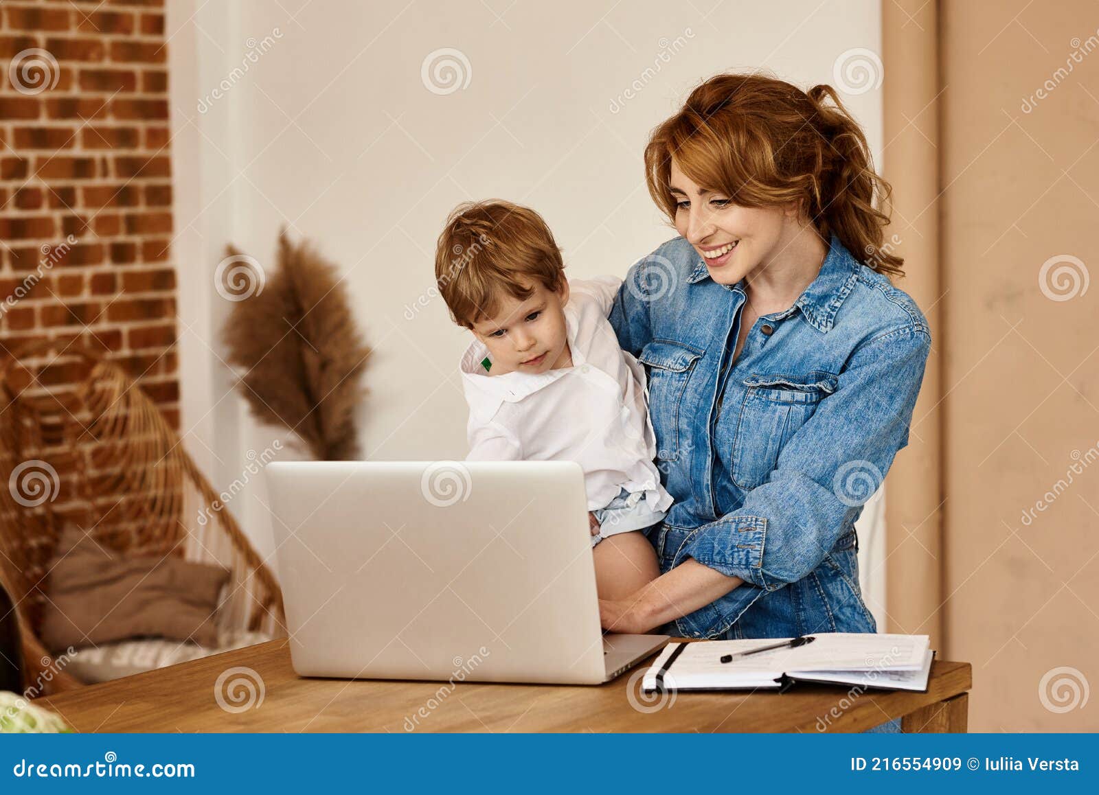 Mom works at the computer stock image. Image of lifestyle - 216554909