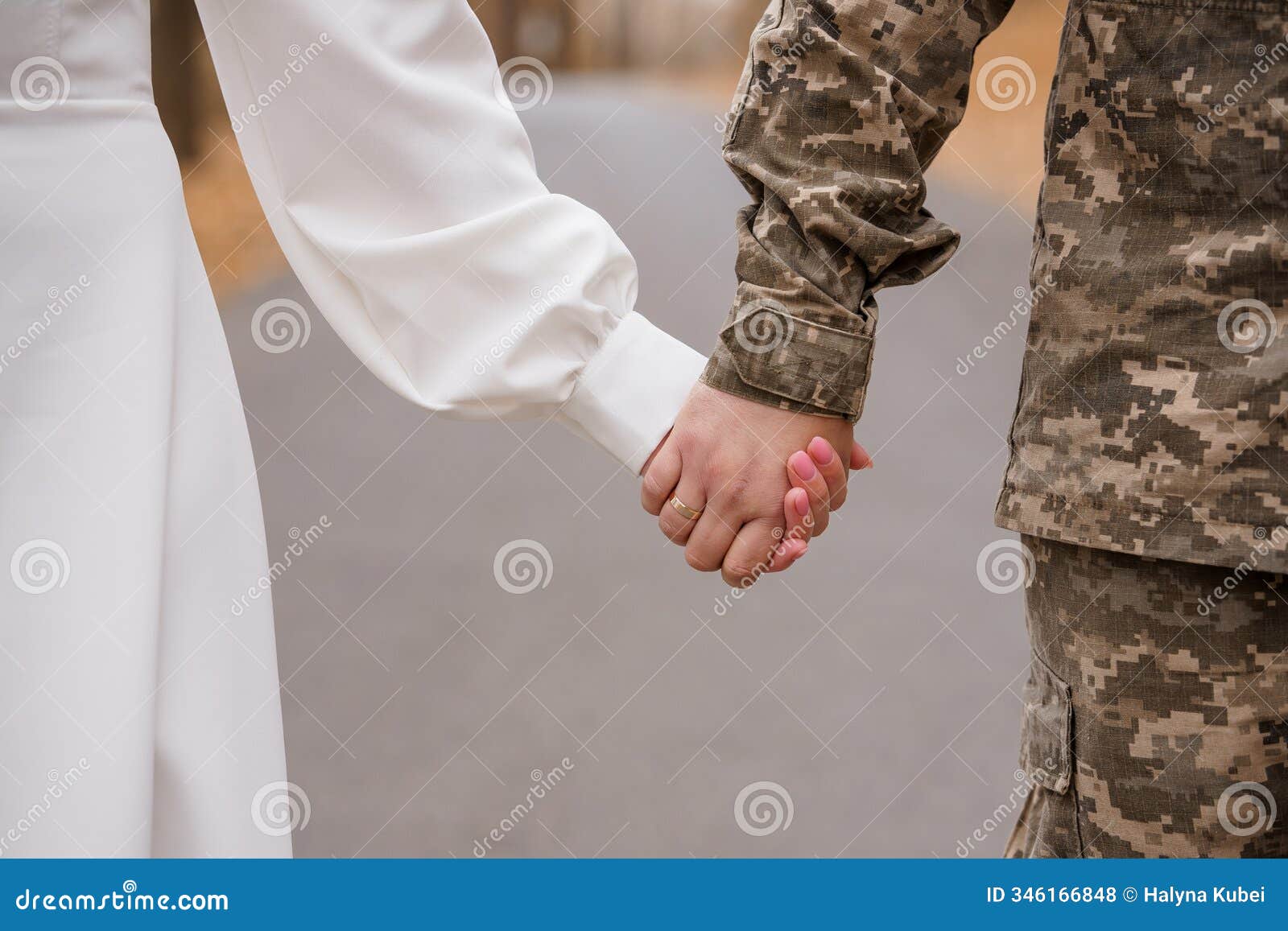 A Moment of Unity: a Bride and Soldier Holding Hands Together Stock ...