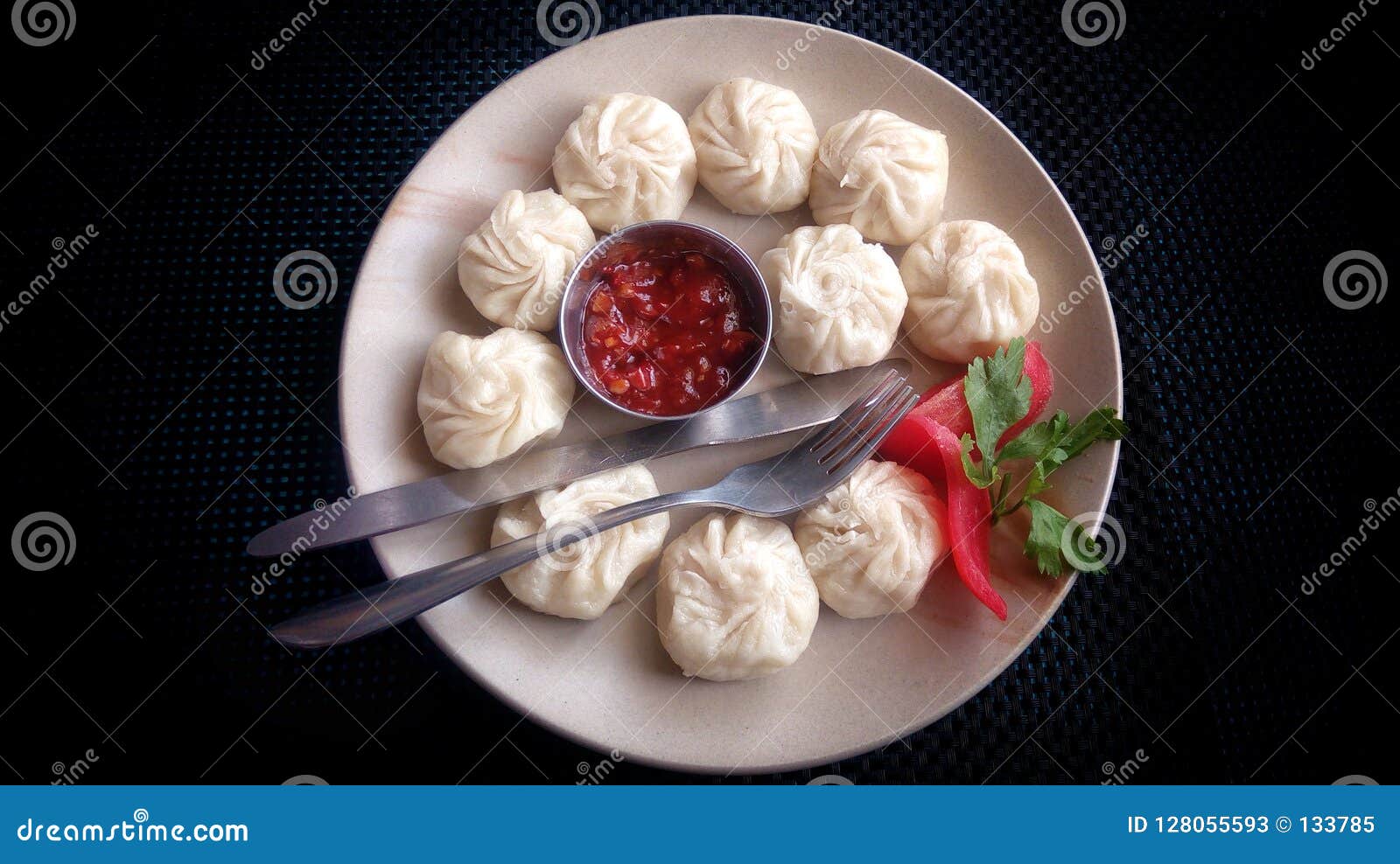 Momo on a plate with sauce stock image. Image of gourmet - 128055593