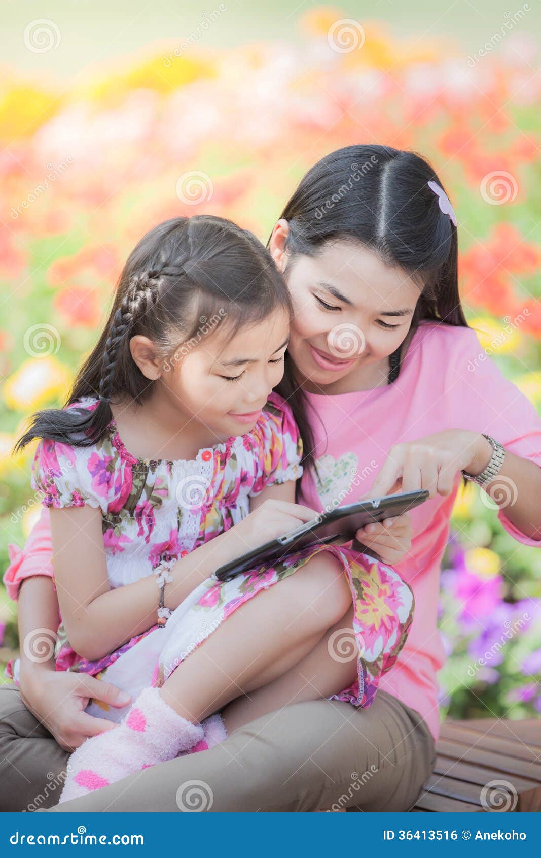 Mon and baby take tablet stock photo. Image of education - 36413516