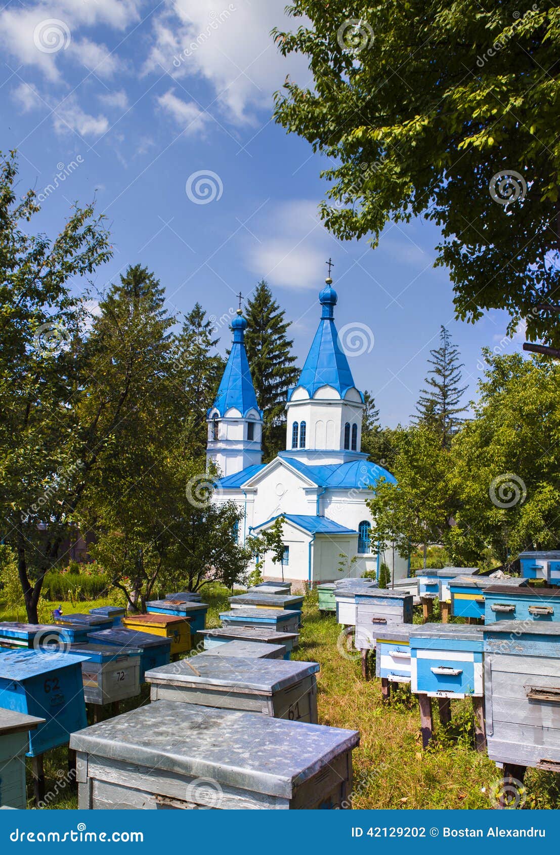 A Monastery Surrounded by Hives with Bees Stock Photo - Image of ...
