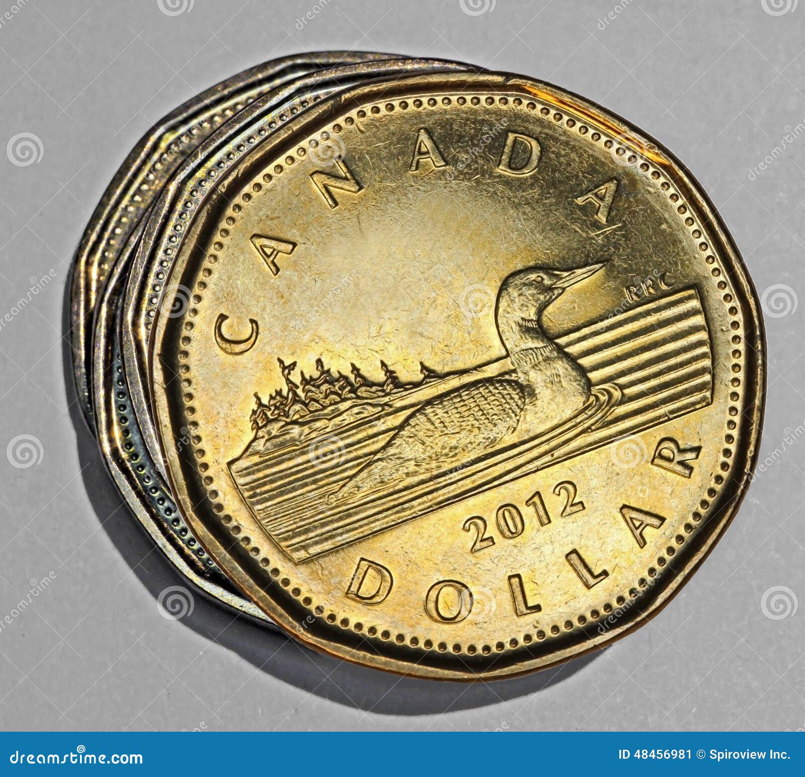Monedas Del Dólar Canadiense Foto editorial - Imagen de moneda ...