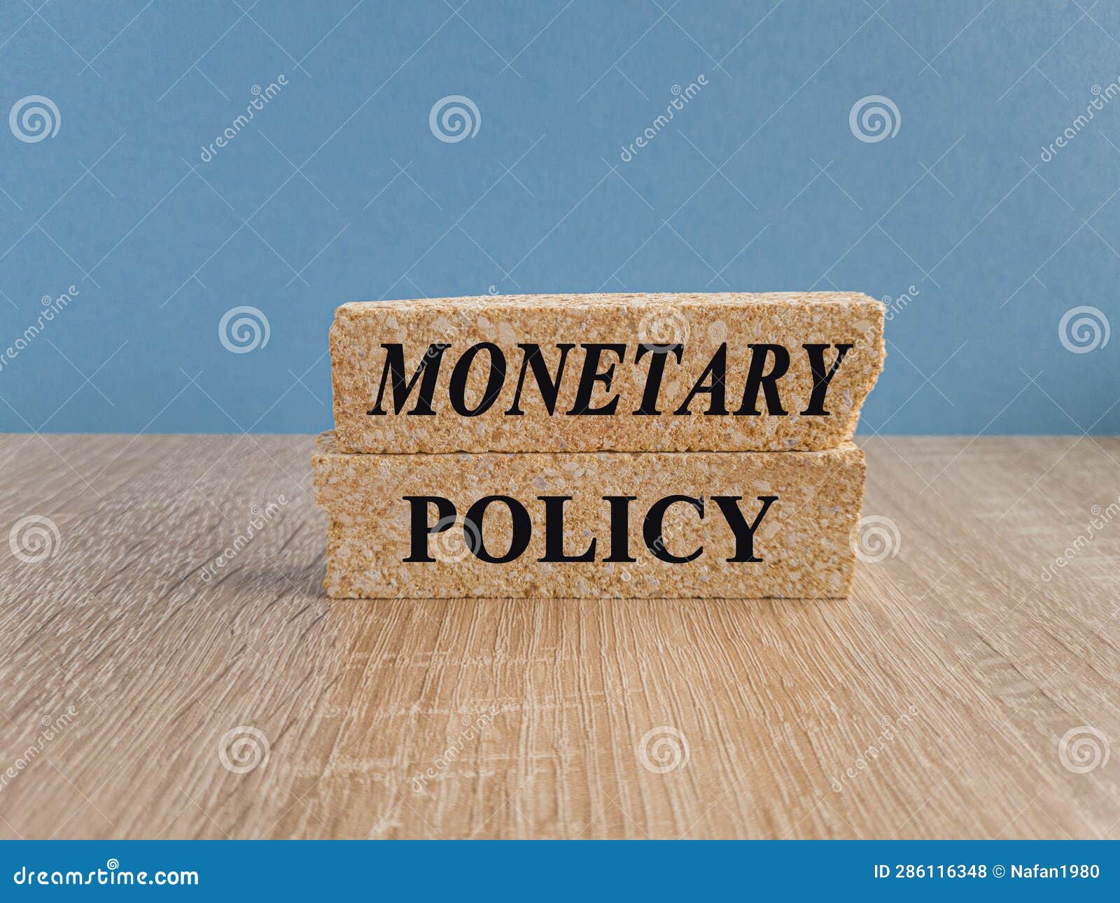 Monetary Policy Symbol. Concept Words Monetary Policy on Brick Blocks ...