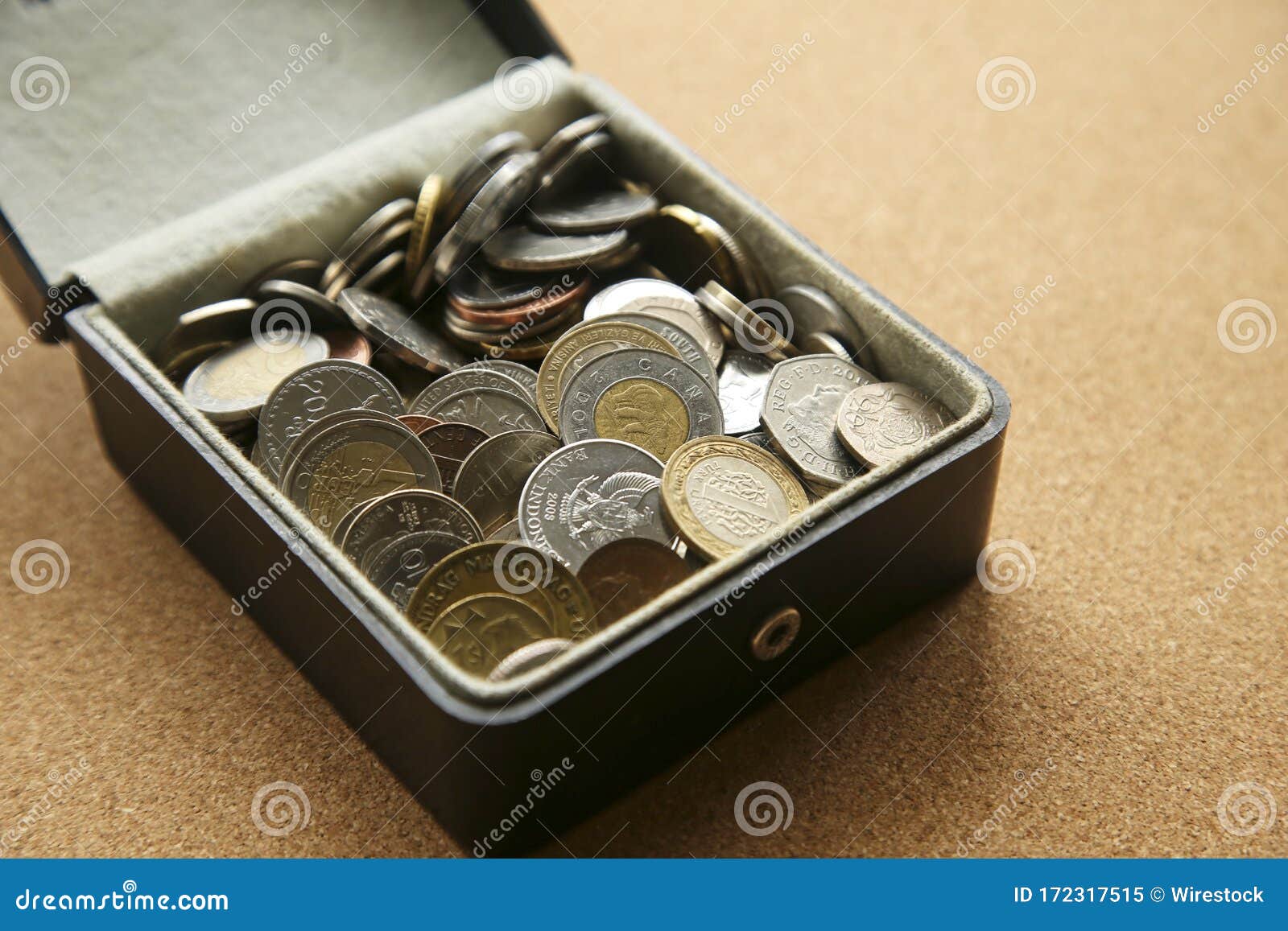Money from Around the World Inside a Box. Stock Image - Image of ...
