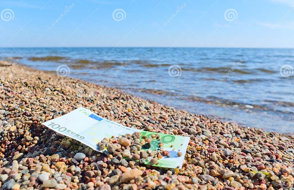 Money on the beach. stock photo. Image of stone, dune - 15048282