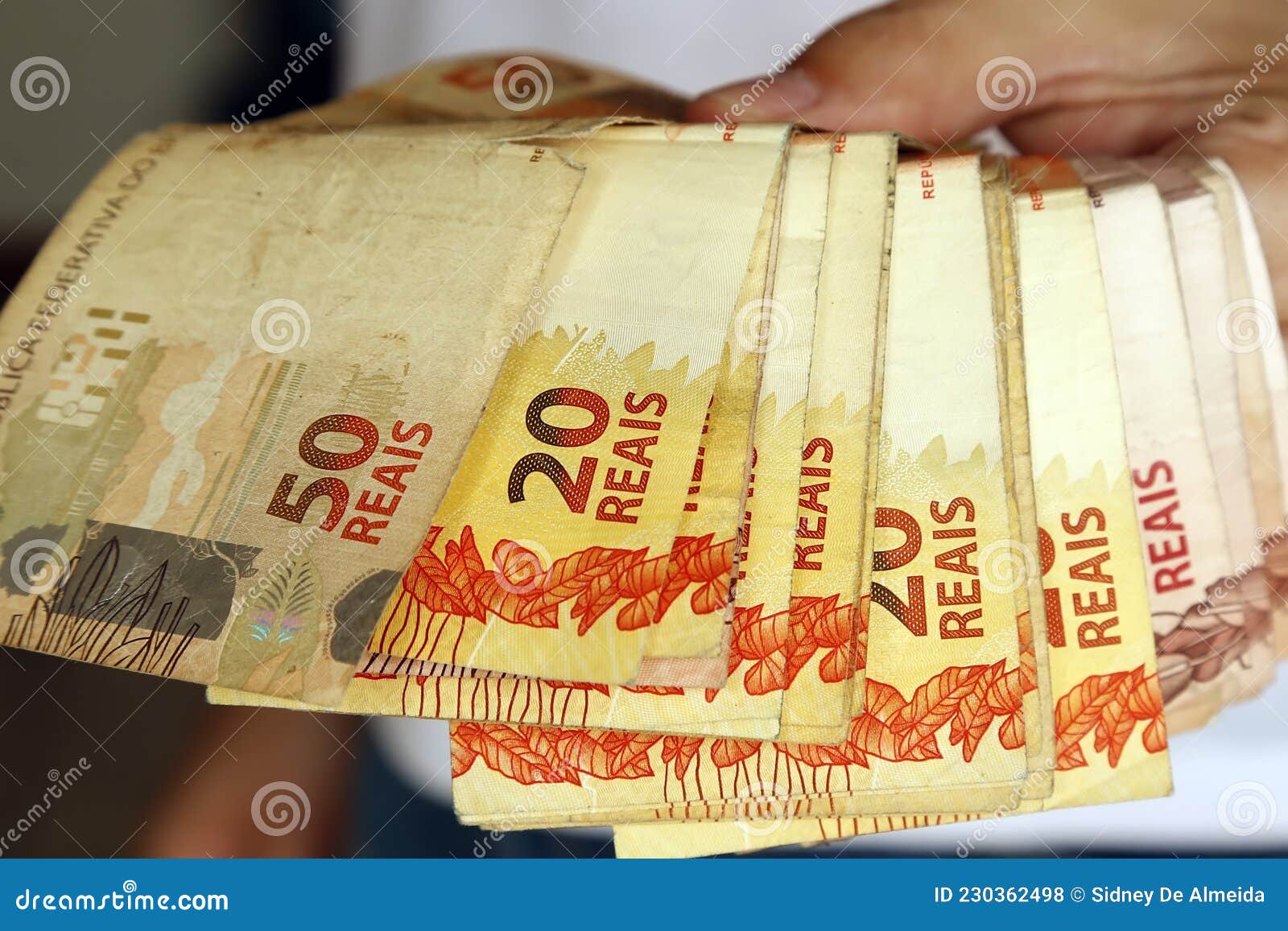 Money from Brazil - Several Real Bills on Hands Stock Photo - Image of ...