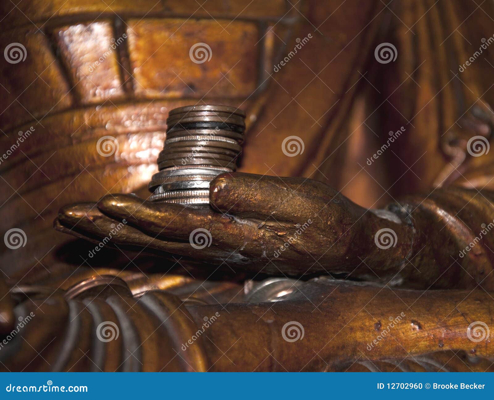 Money in Buddhas Hand stock photo. Image of offering - 12702960