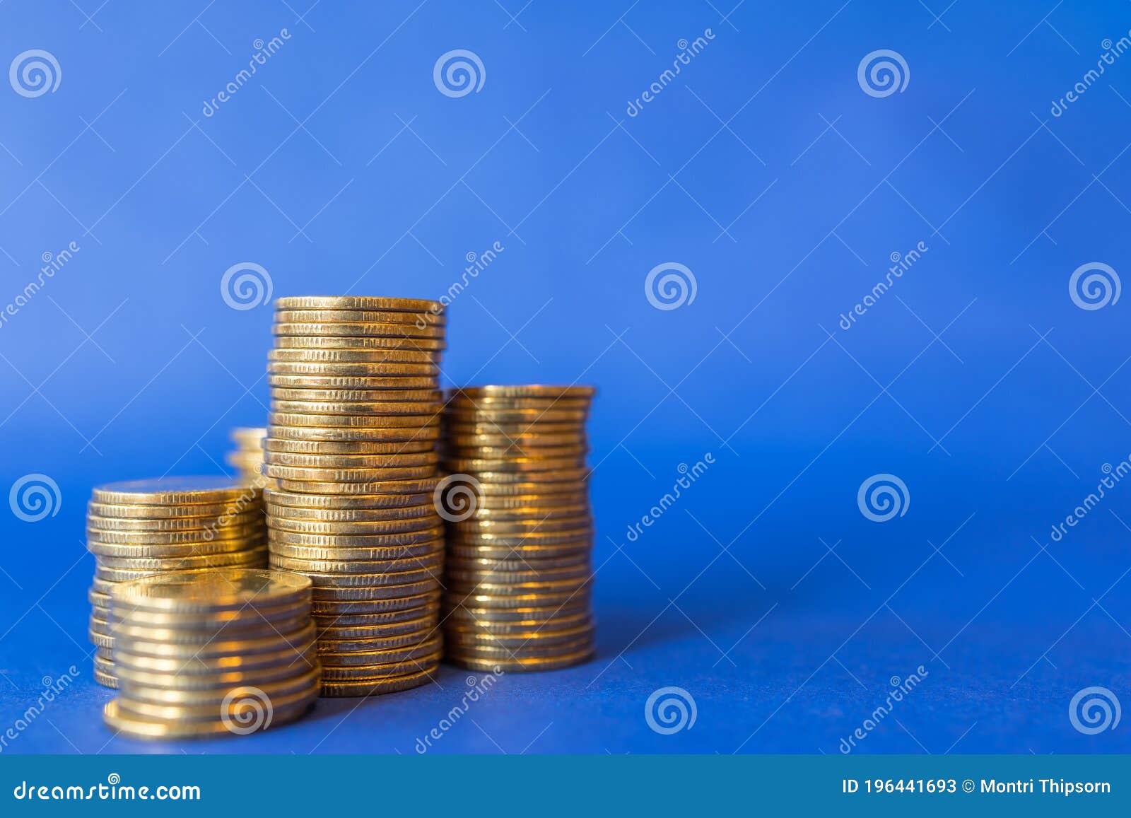 Money, Business and Saving Concept. Closeup of Stack of Gold Coins on ...