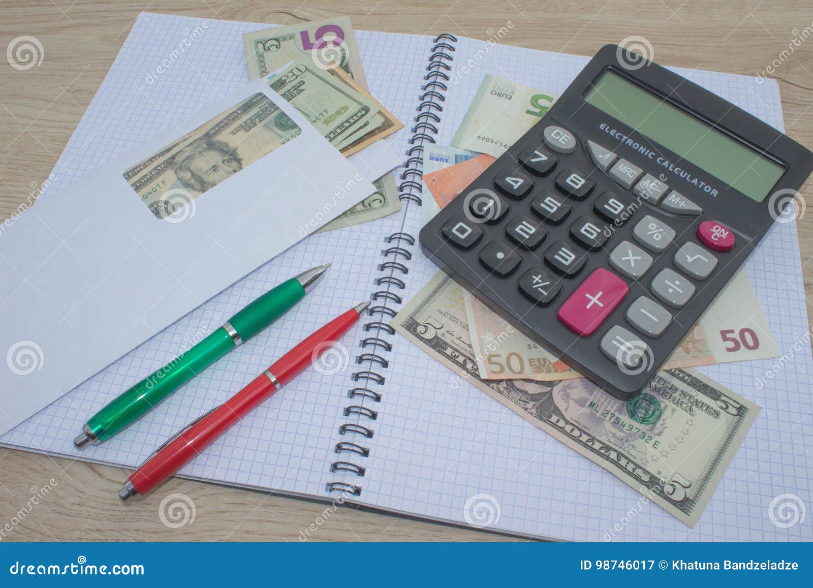 Money with Calculator and Notebook Computer on Wood Table Stock Image ...