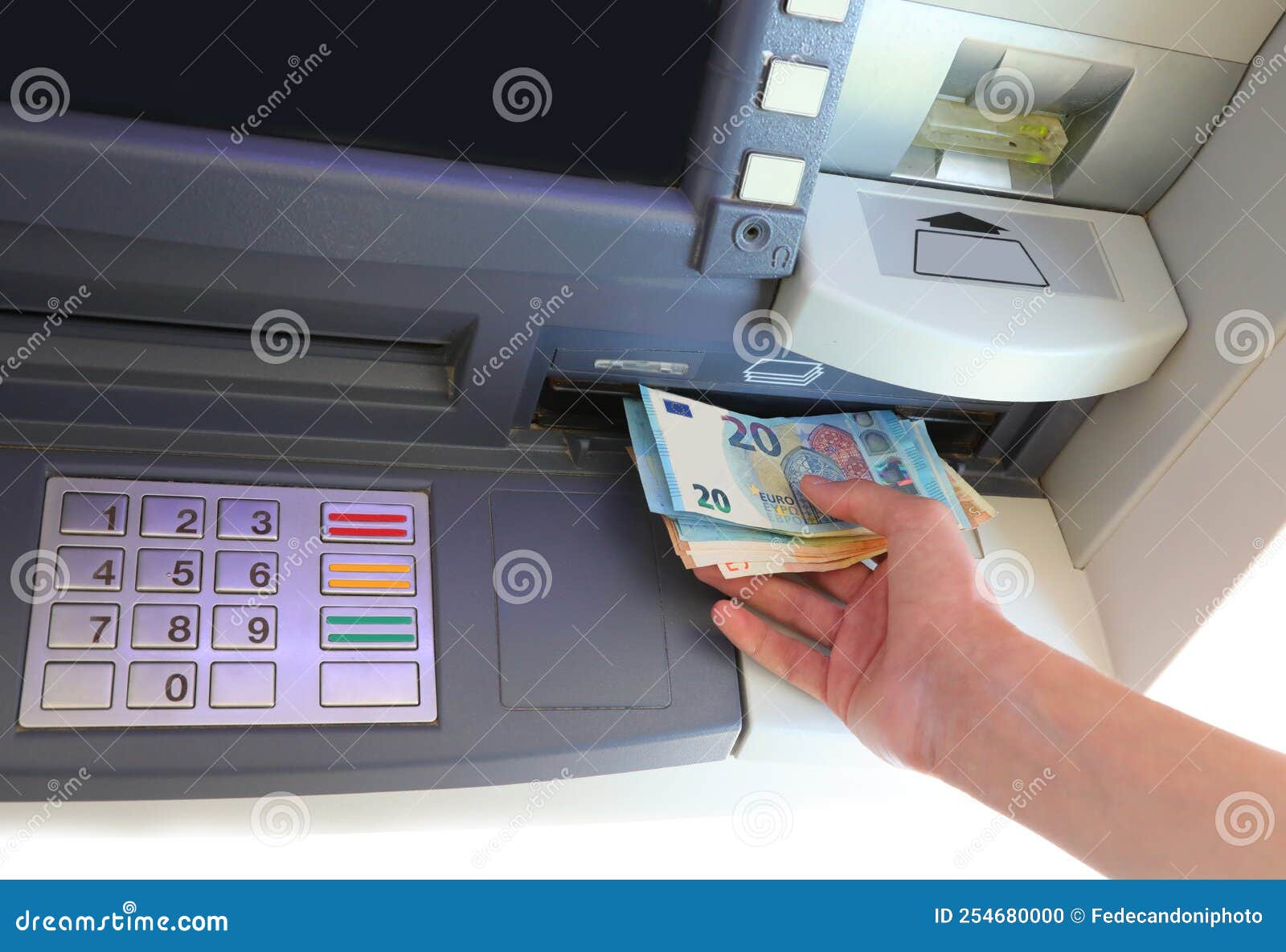 Money from Cash Machine and Numeric Keypad To Enter PIN Code Stock ...