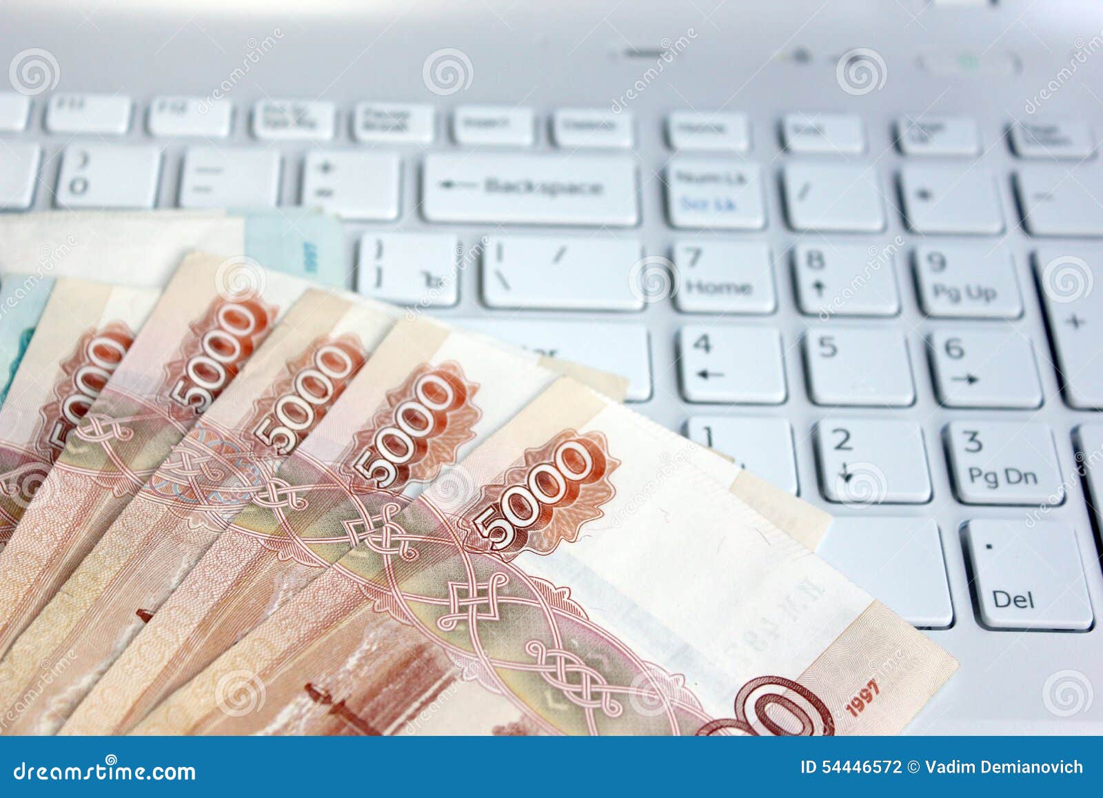 Money for the computer stock photo. Image of financing - 54446572