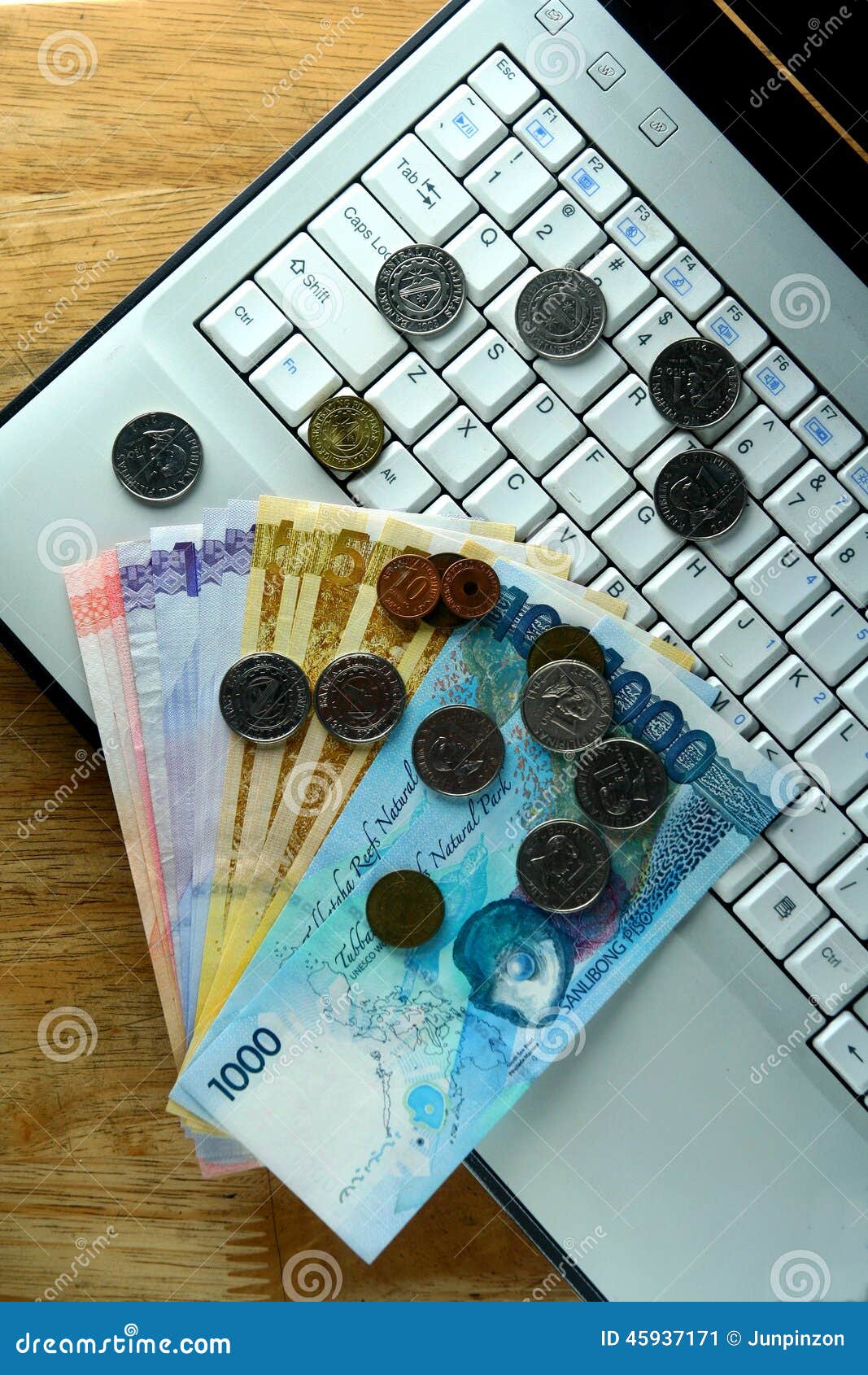 Money on a Computer laptop stock image. Image of bedroom - 45937171