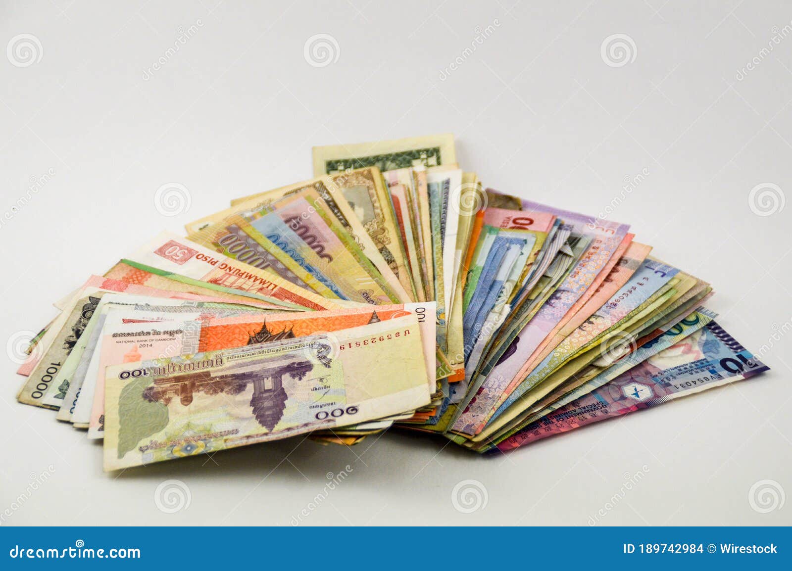 Money in Different Currencies on a White Table Stock Photo - Image of ...