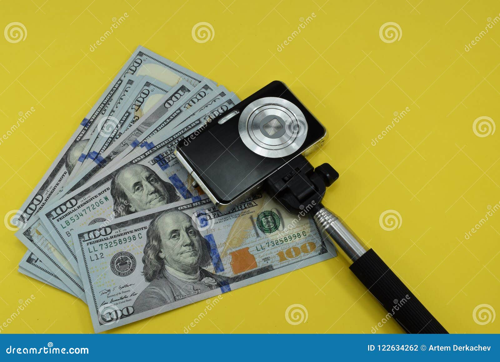 Money and a Photo Camera on a Yellow Background Stock Photo - Image of ...