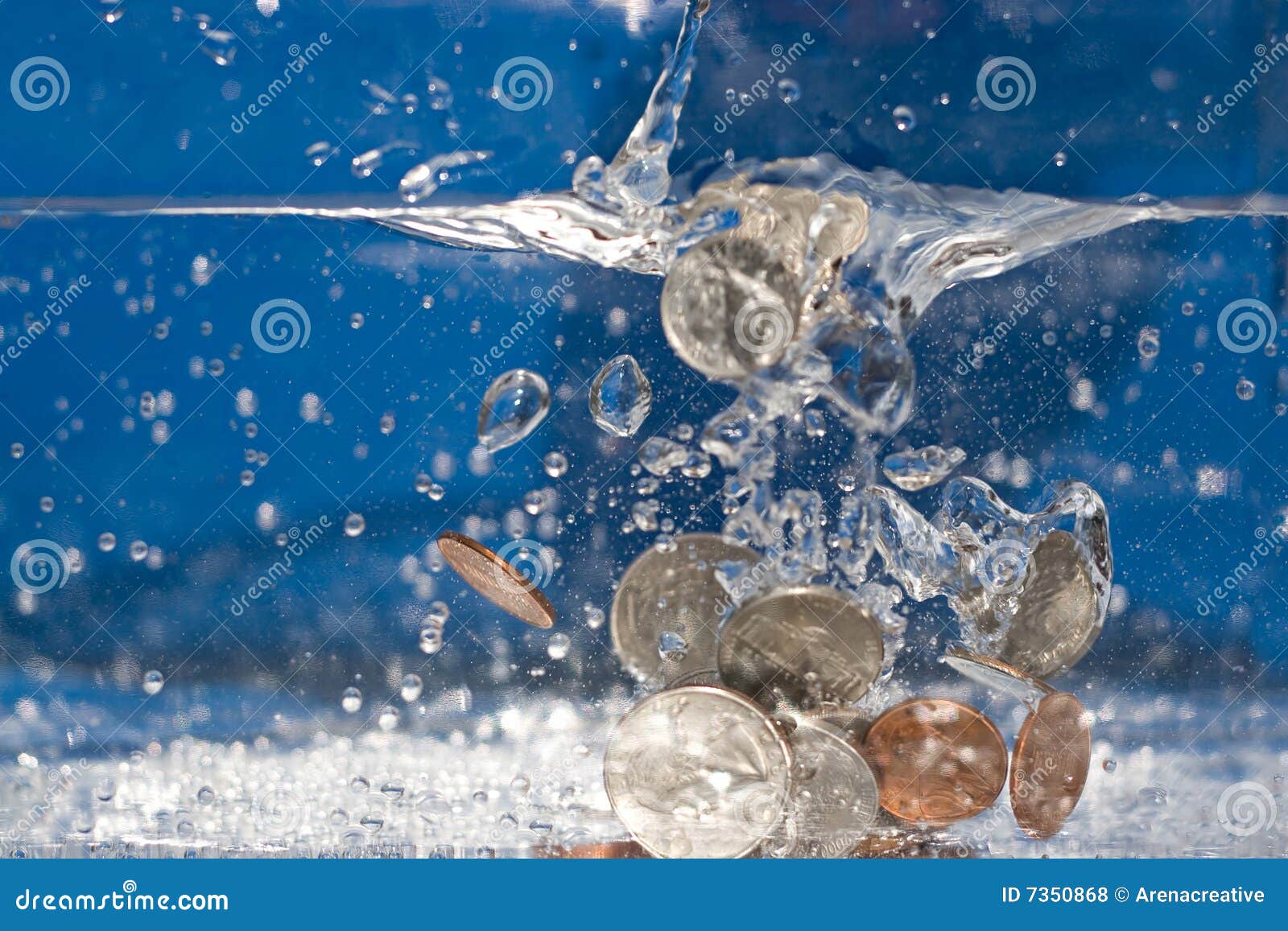 Money Down the Drain stock photo. Image of droplets, nickels - 7350868