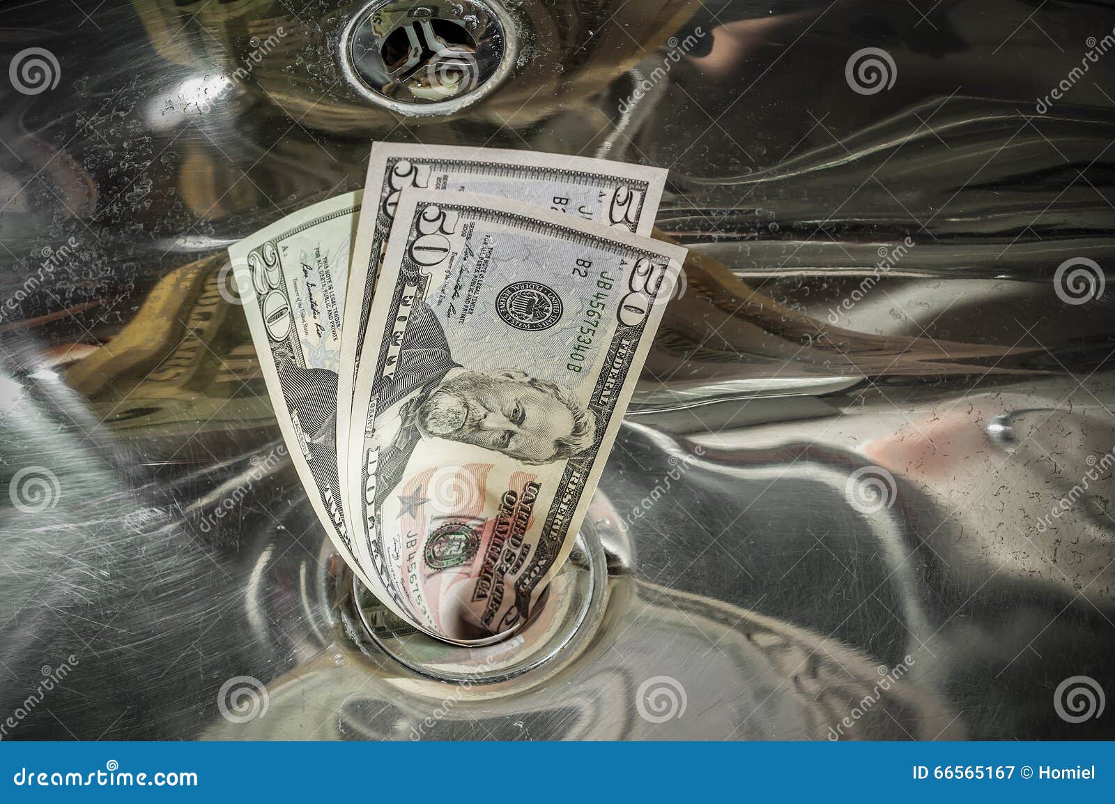 Money Down Drain Stock Images - Download 336 Royalty Free Photos