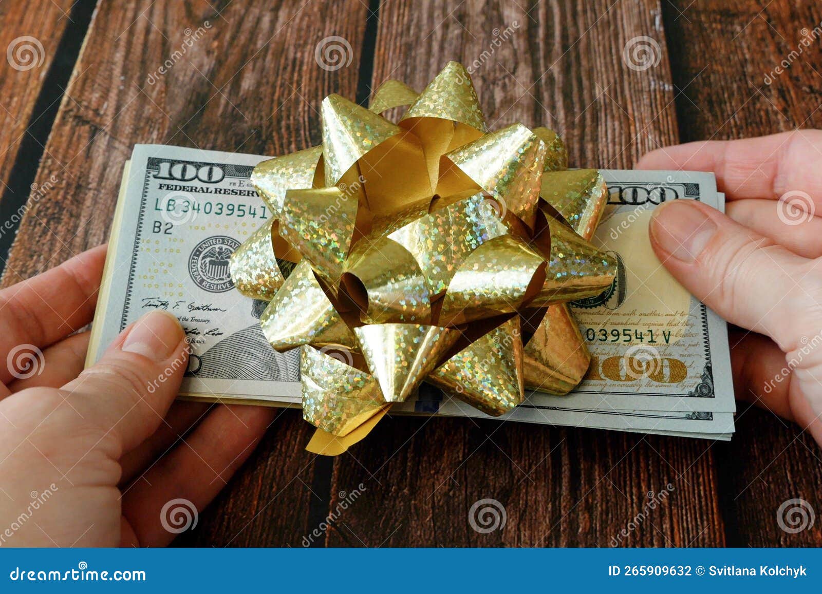 Money Gift, Big Stack of Money with Golden Bow on Wooden Background ...