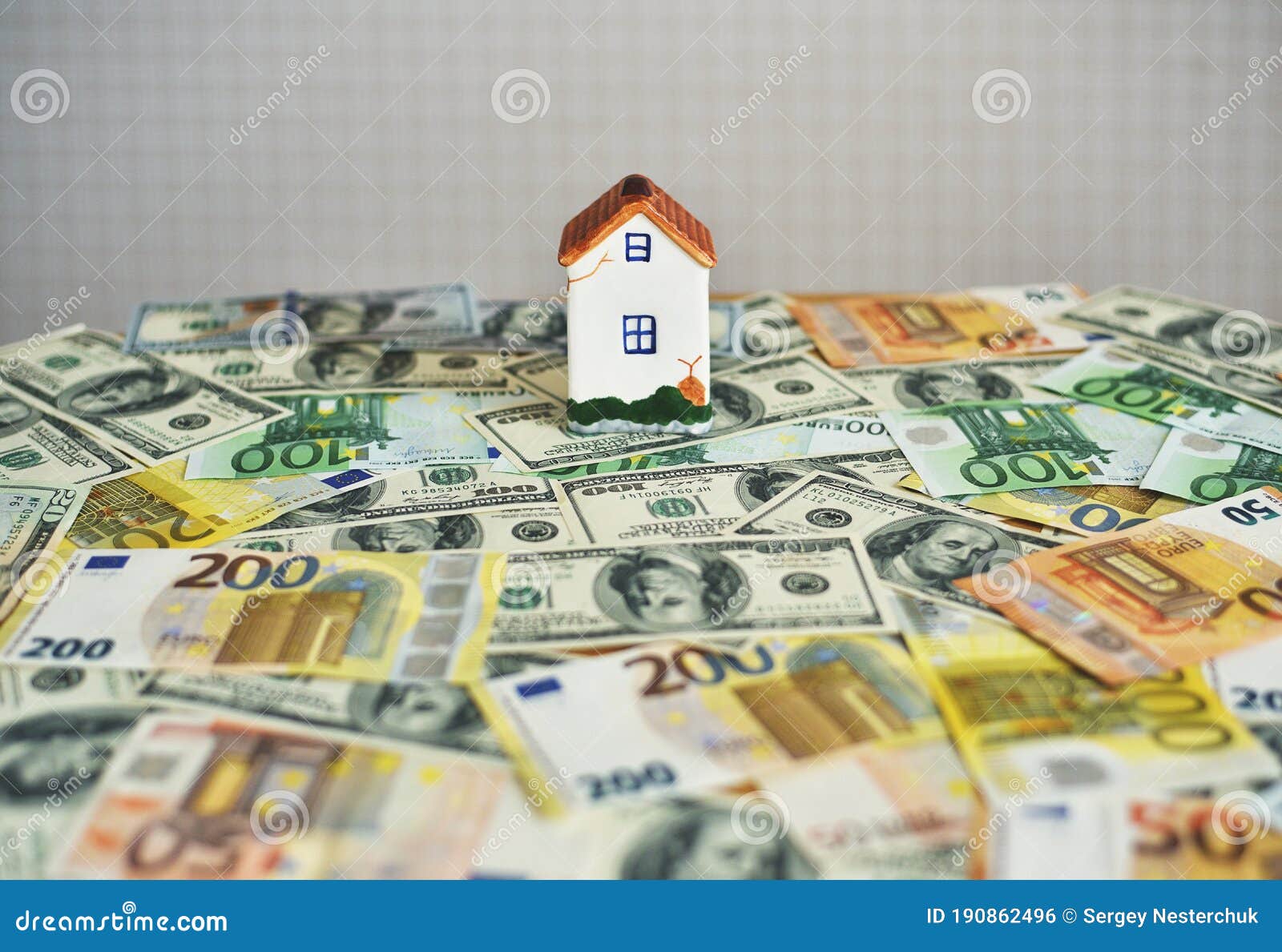 Money and House Model on the Table. Concept on the Topic of ...