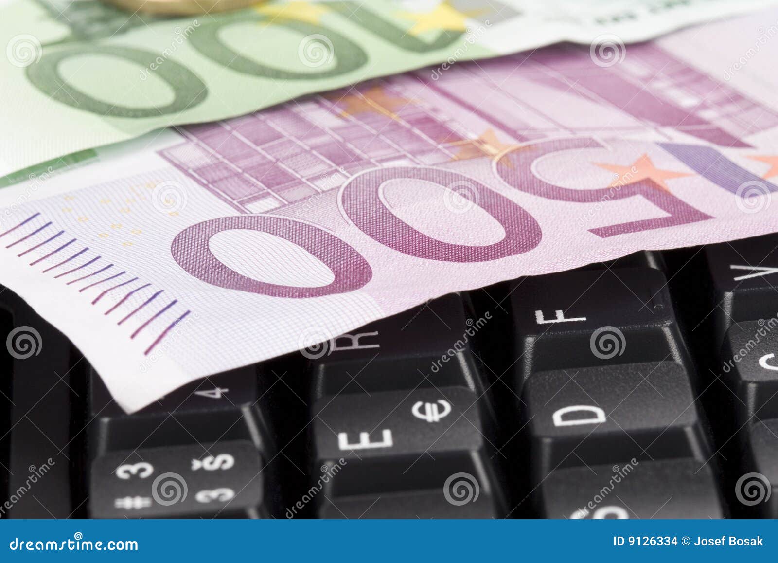 Money on a keyboard stock photo. Image of commercial, keyboard - 9126334
