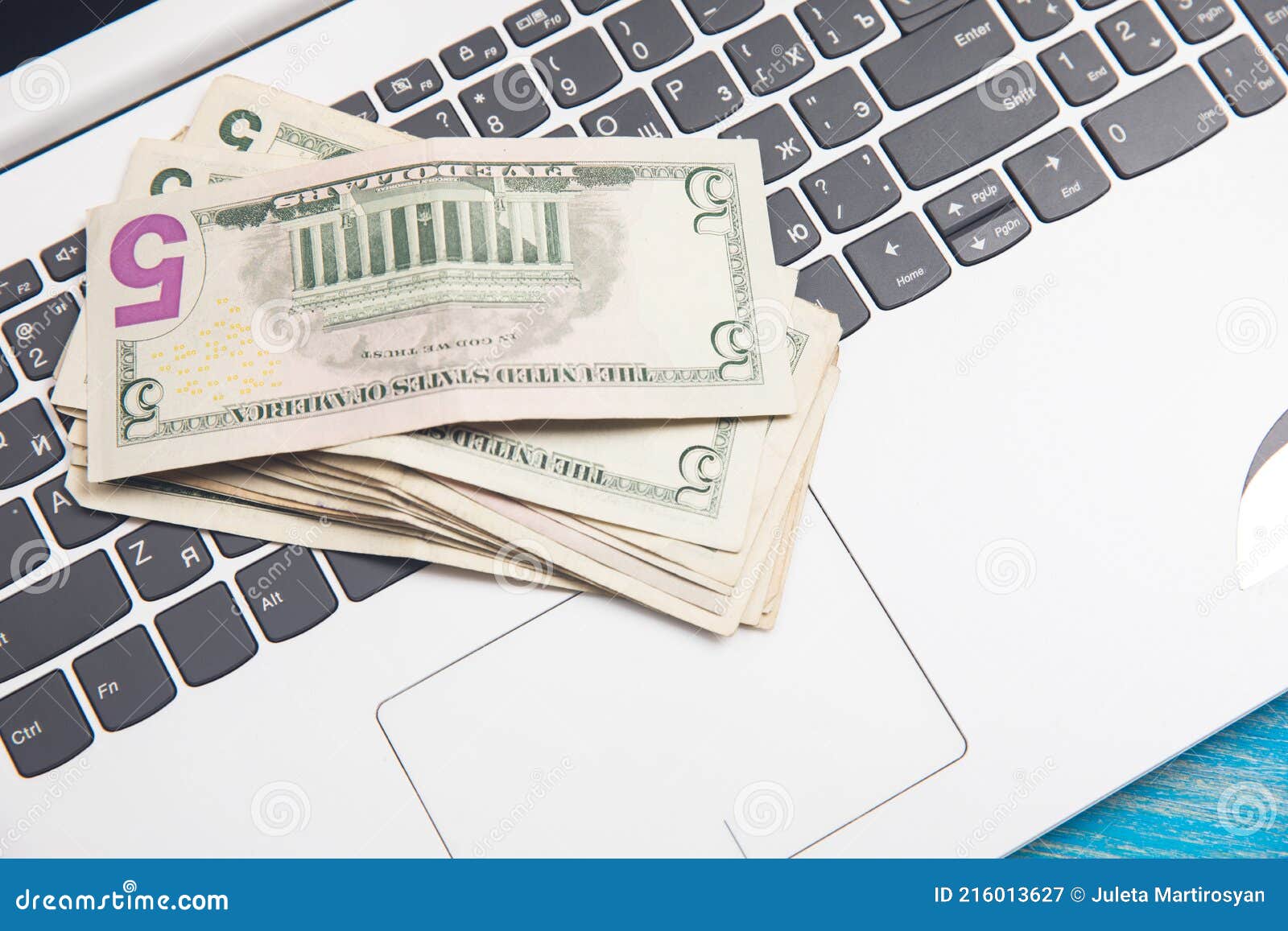 Money on laptop stock image. Image of online, currency - 216013627
