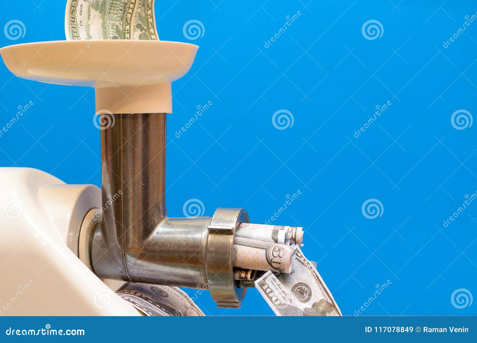 Money Passes through a Meat Grinder. Blue Background. Stock Image ...