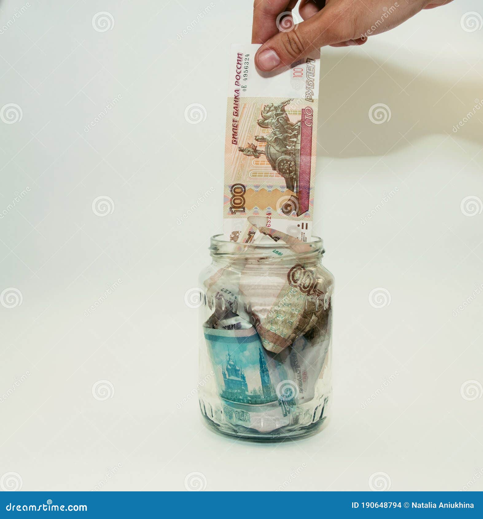 Money is Poured into a Glass Jar Filled with Banknotes Stock Photo ...