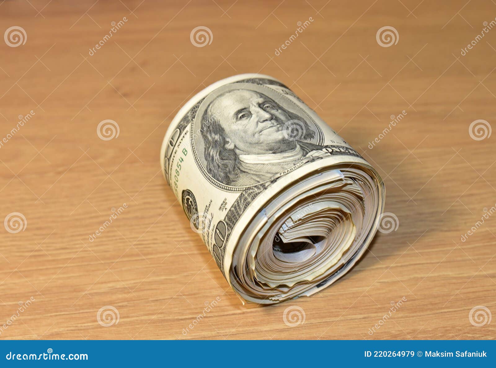 Money Roll Dollars on Wooden Table in Office. Stack of Money Rolls 100 ...